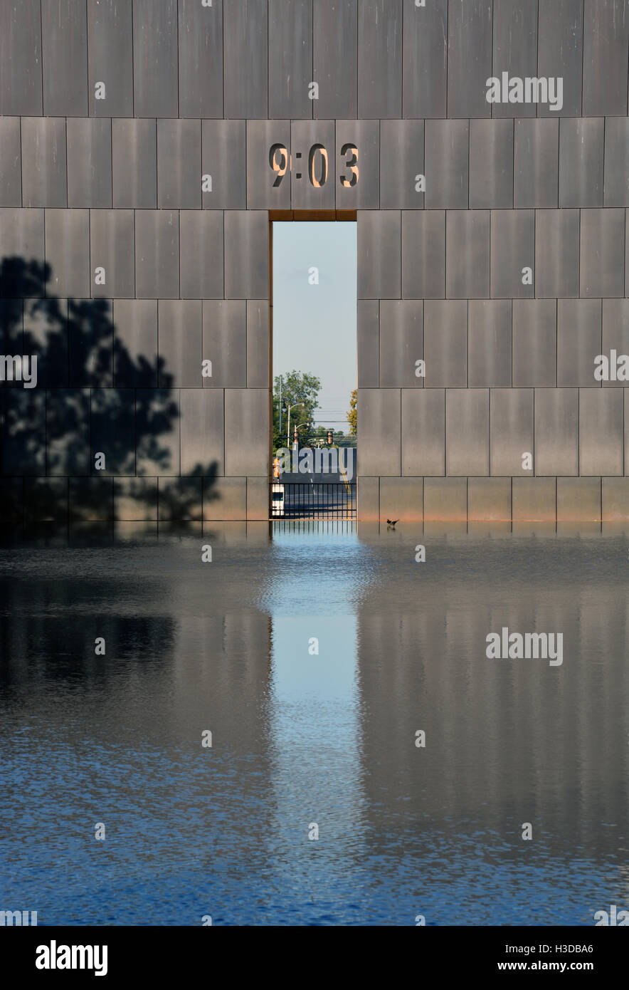 Two gates at the Oklahoma City National Memorial mark before (9:01) and ...