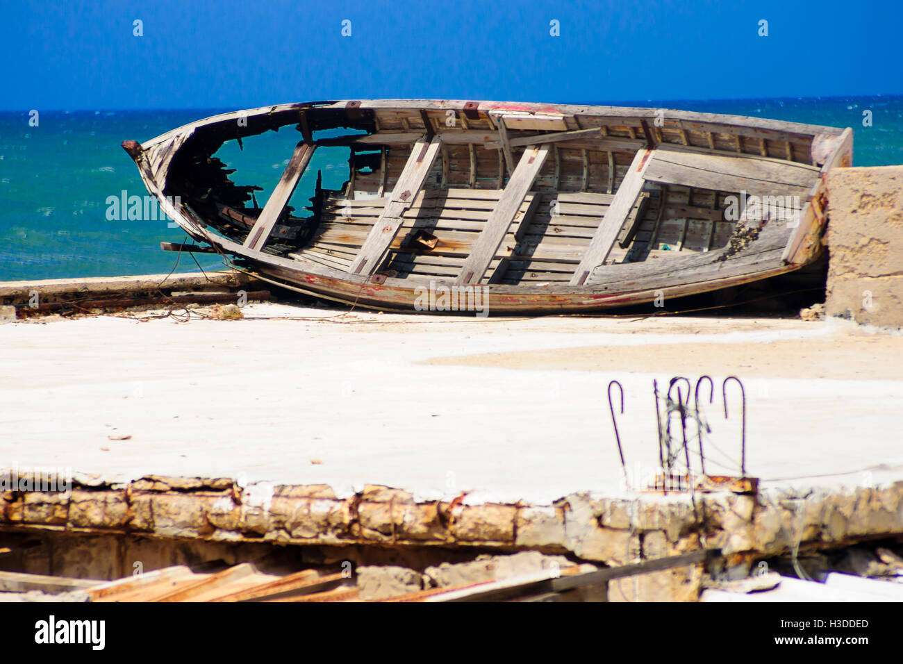 An old and wrecked wood boat, on a roof near the sea Stock Photo - Alamy