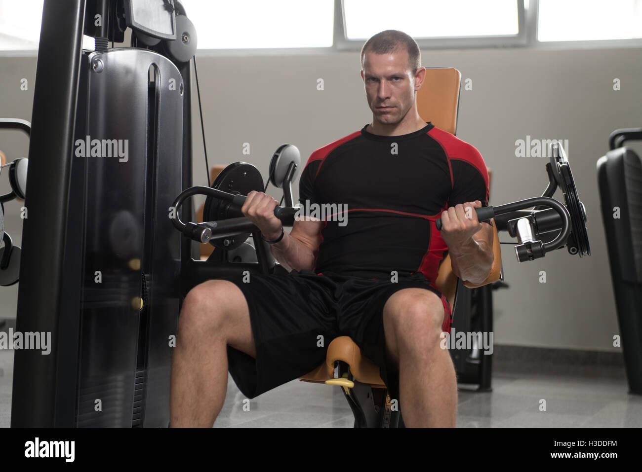 Good Looking And Attractive Man Doing Heavy Weight Exercise For Biceps ...