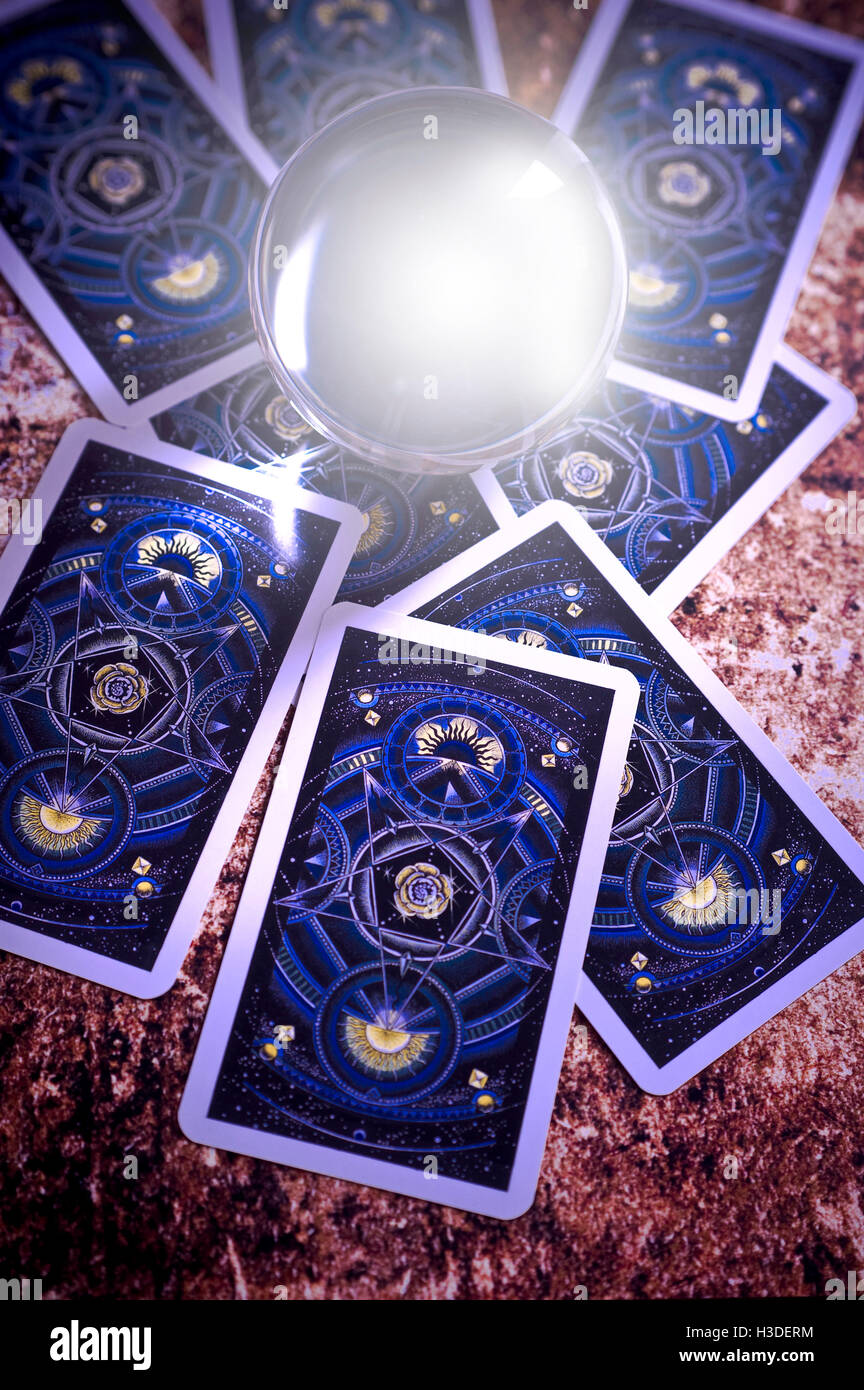 tarots and magic ball Stock Photo - Alamy