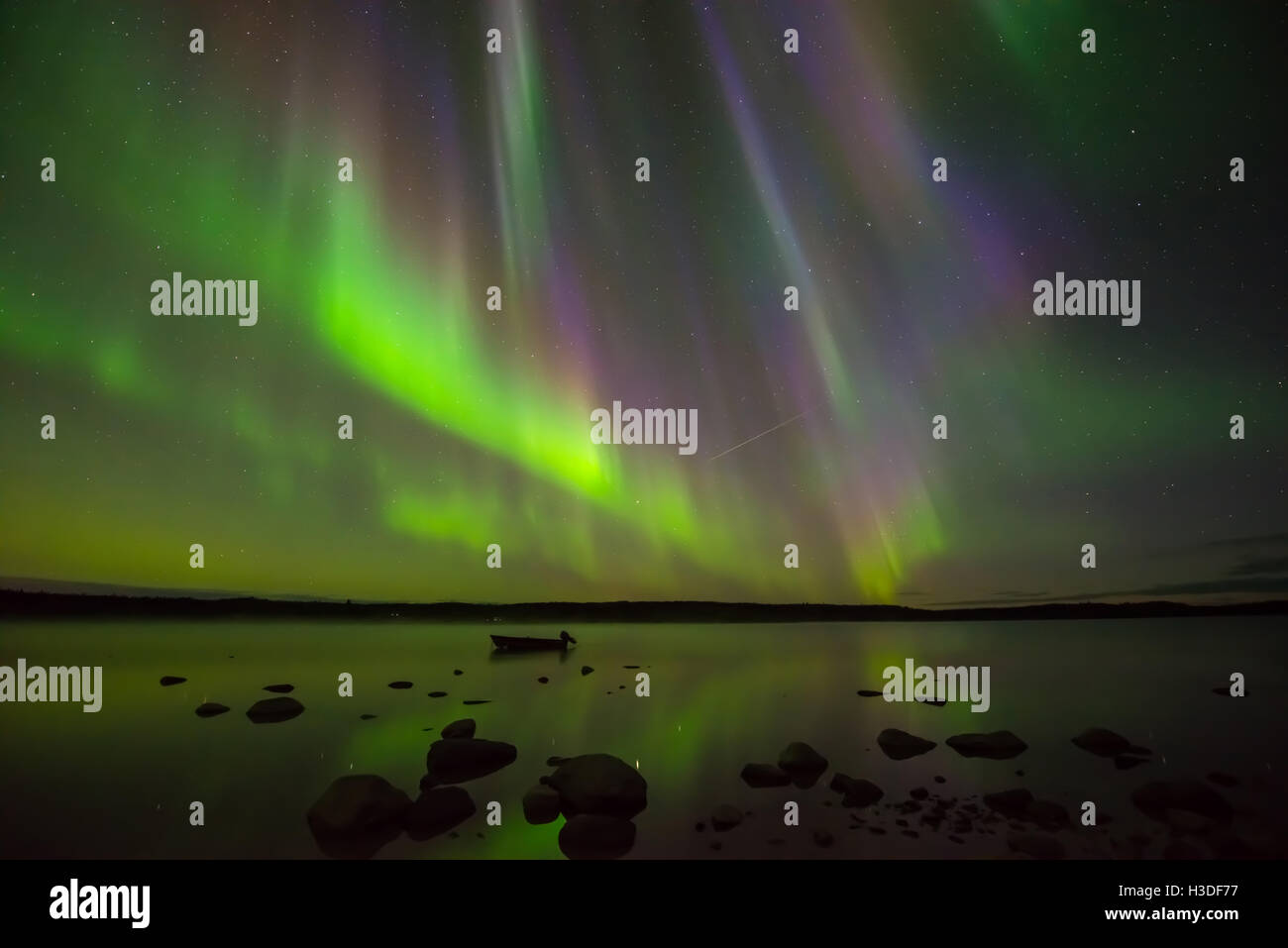 Colors of Northern Lights - Multi-colored aurora borealis hovering over ...