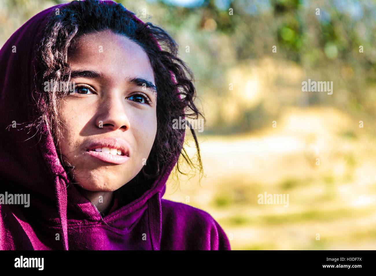 Girl looking off into the distance Stock Photo - Alamy
