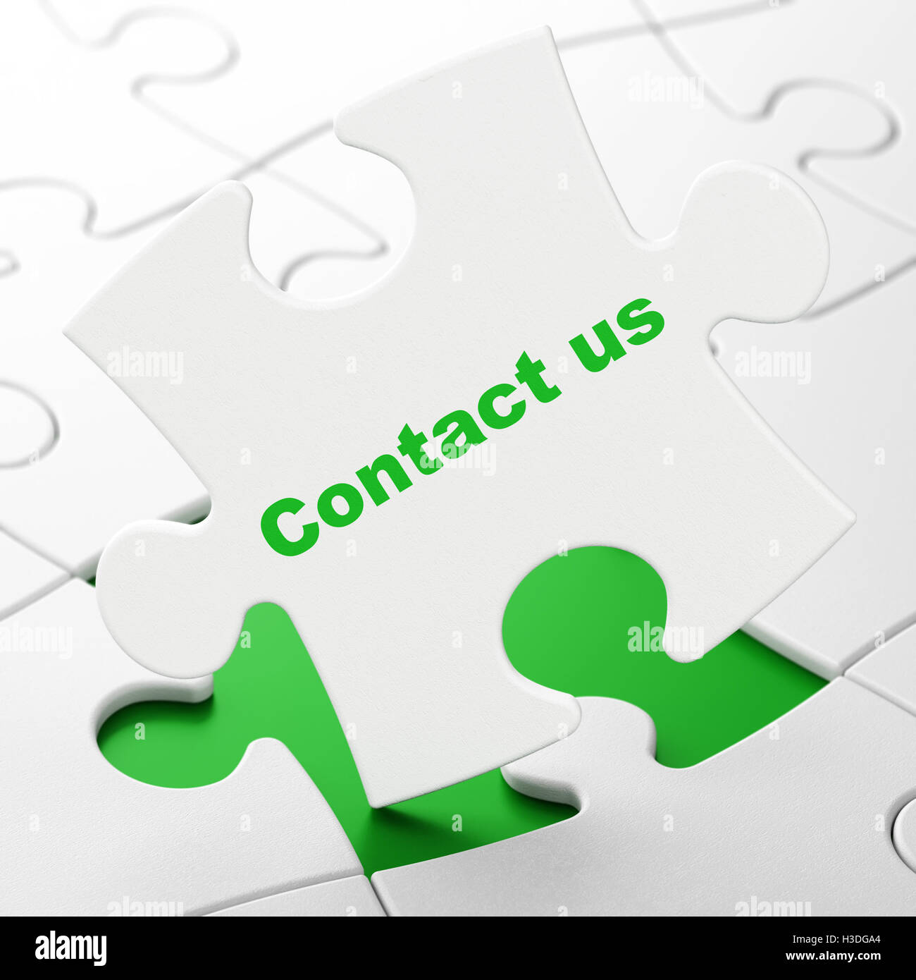 Advertising concept: Contact Us on puzzle background Stock Photo - Alamy