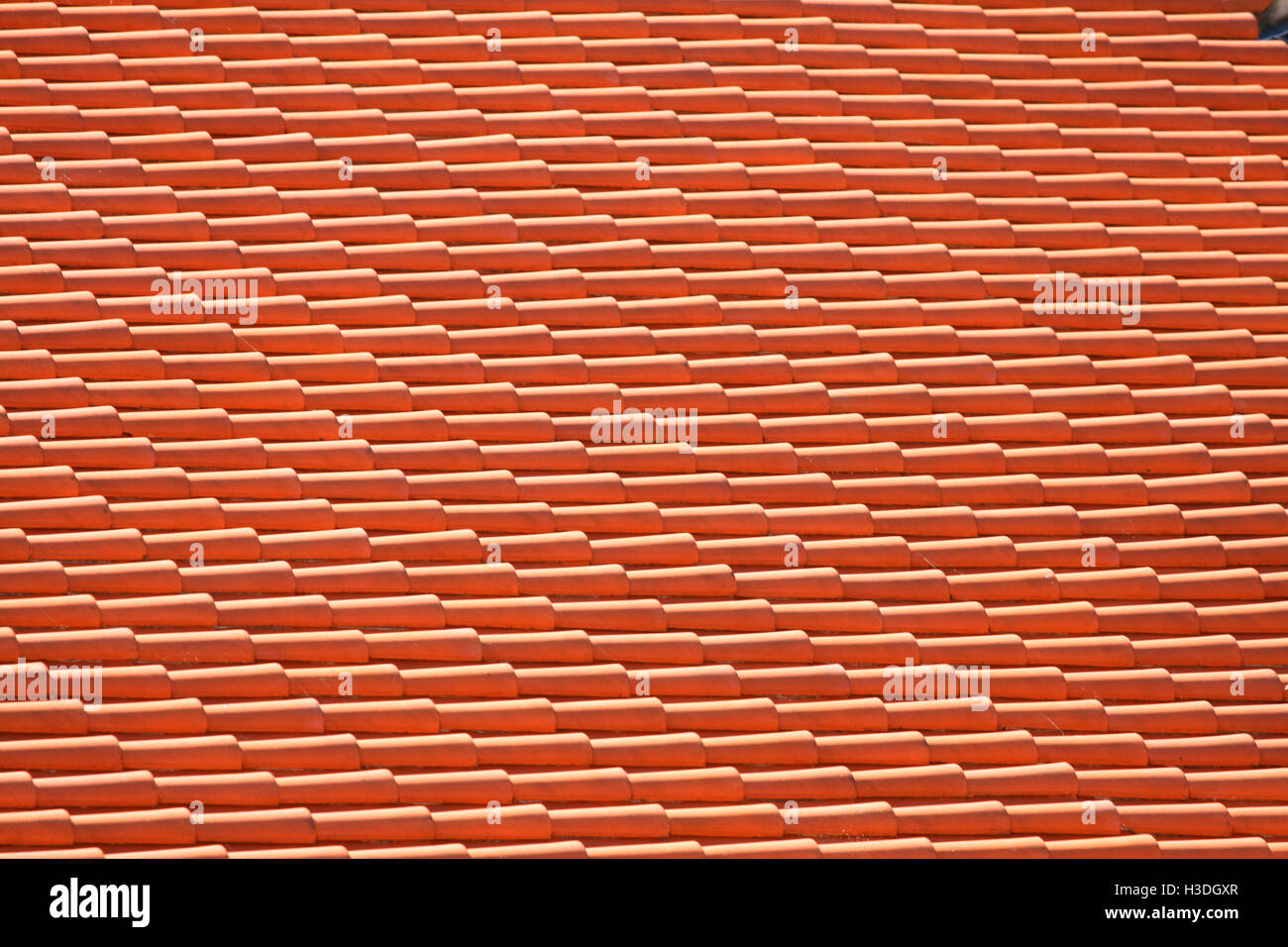 Red tiles roof background Stock Photo - Alamy