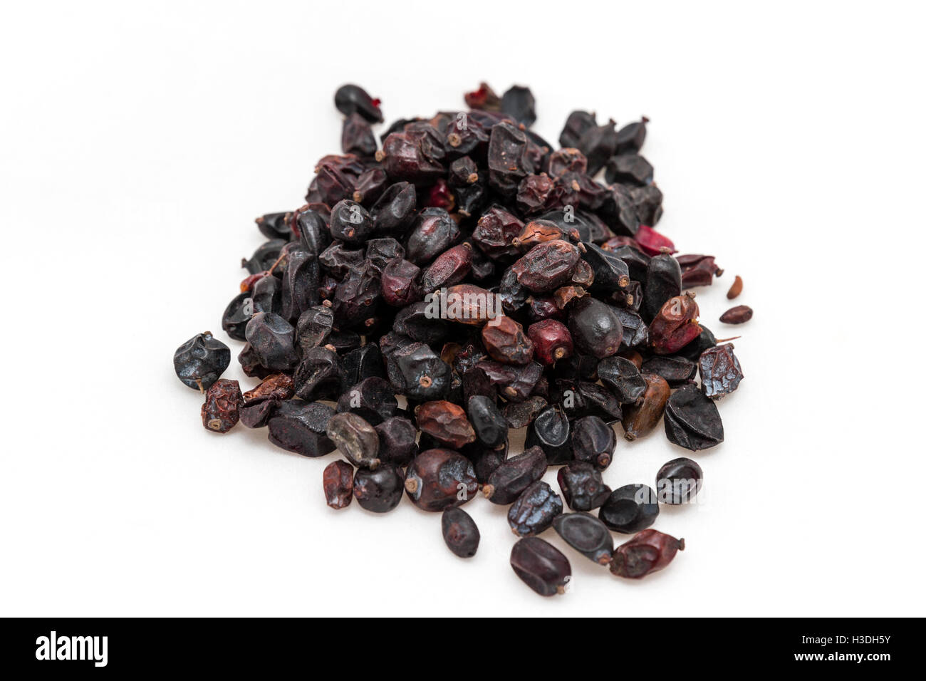 Dried berries of barberry isolated on white background Stock Photo - Alamy