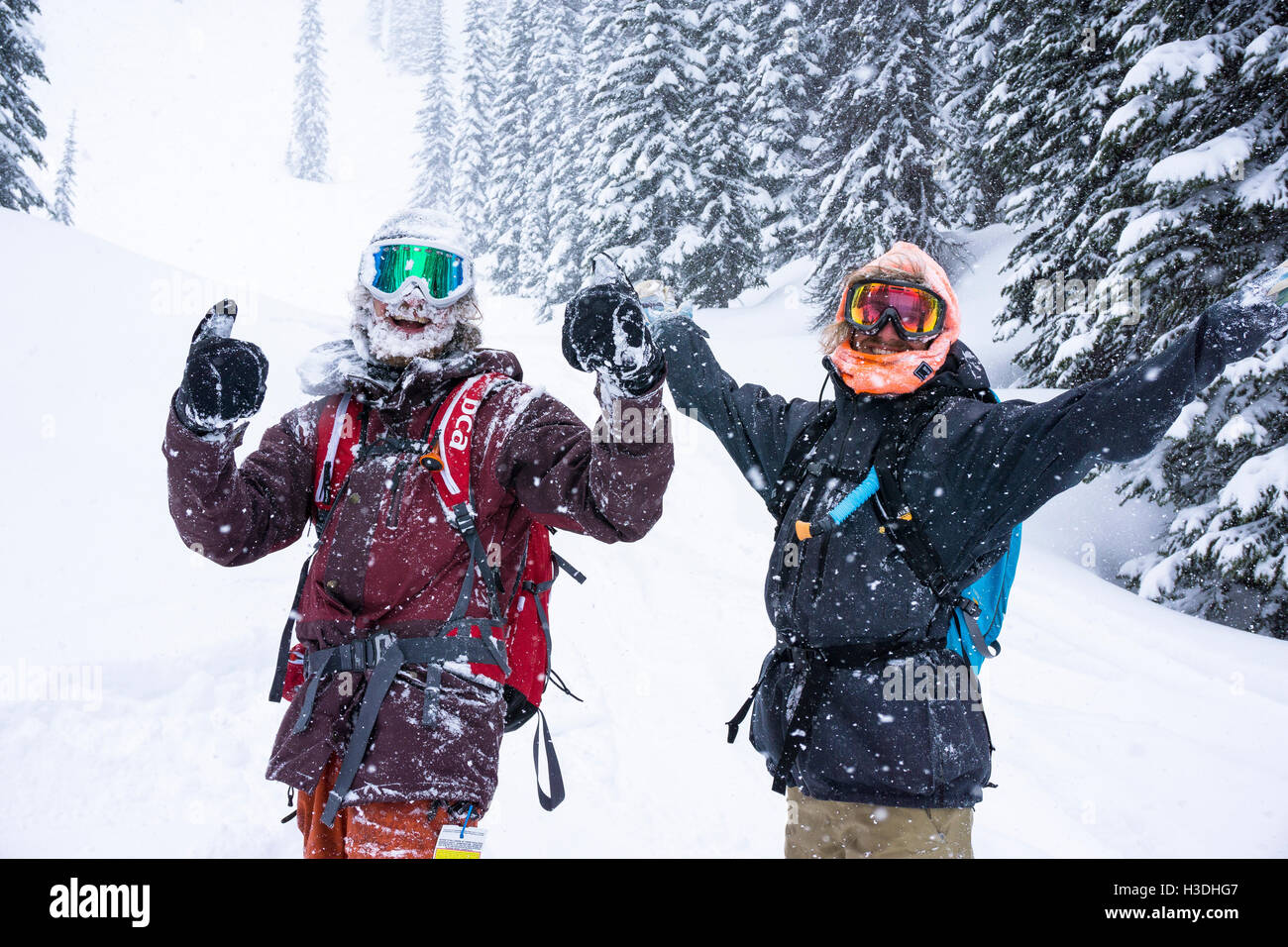 Friends stoked after a powder run Stock Photo - Alamy