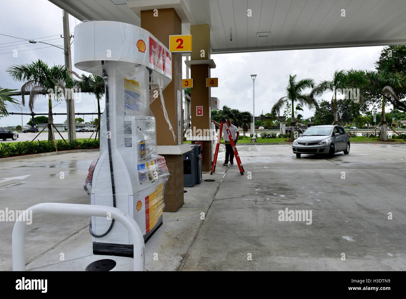 Miramar, FL, USA. 06th Oct, 2016. A gas station's pumps are wrapped and ...
