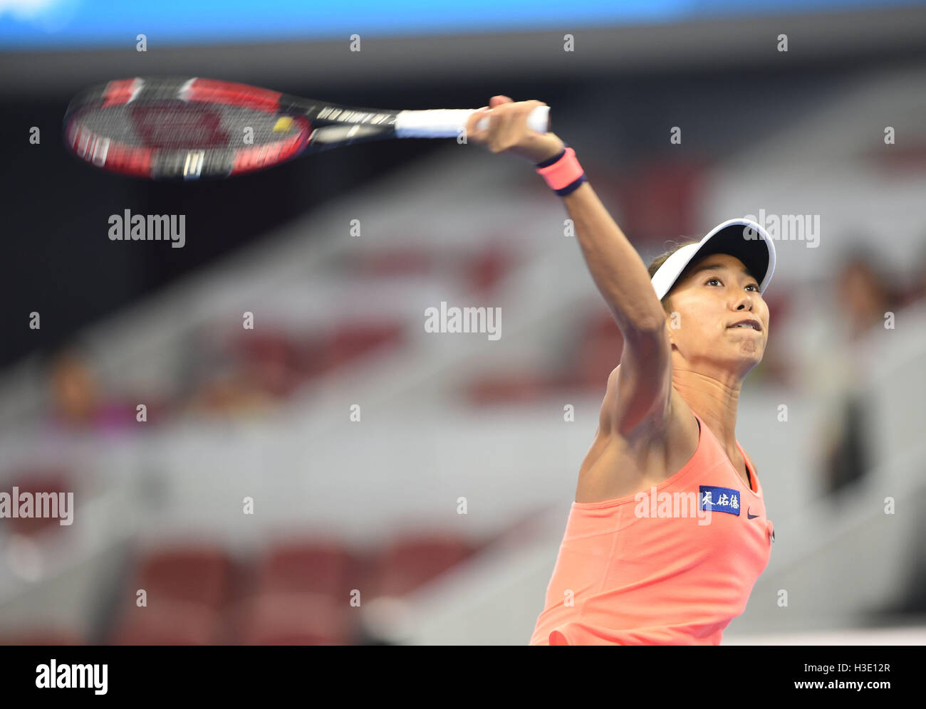 Beijing, China. 7th Oct, 2016. Zhang Shuai of China serves the ball during her women's singles ...