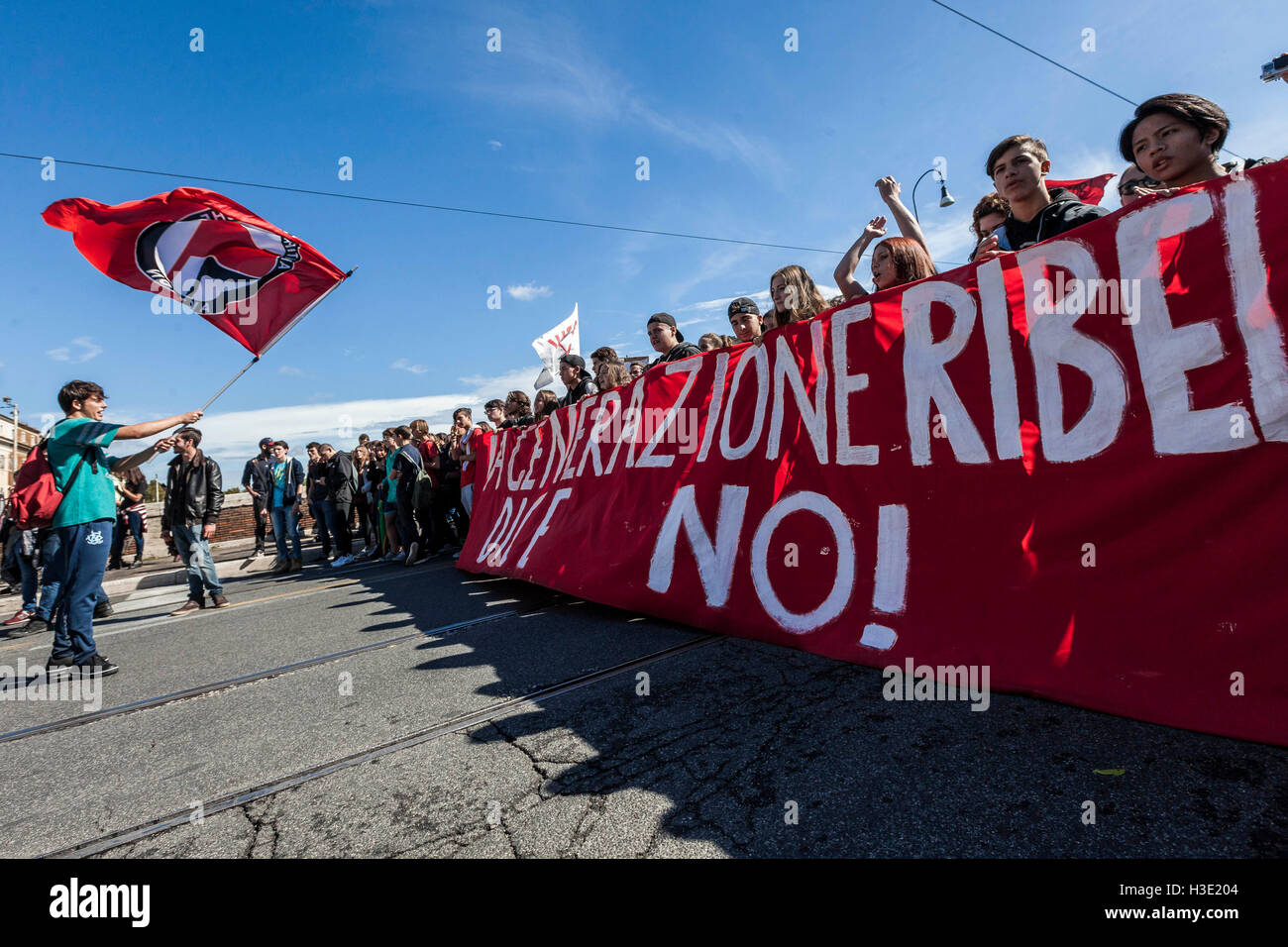 Rome, Italy. 07th October, 2016. Students wave flags and shout slogans ...