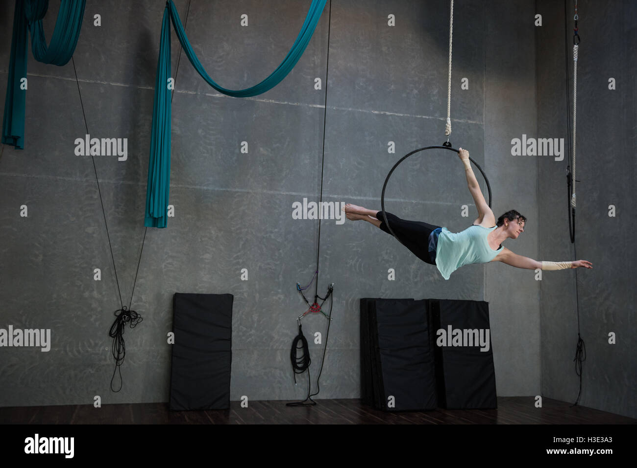 Gymnast performing gymnastics on hoop Stock Photo - Alamy