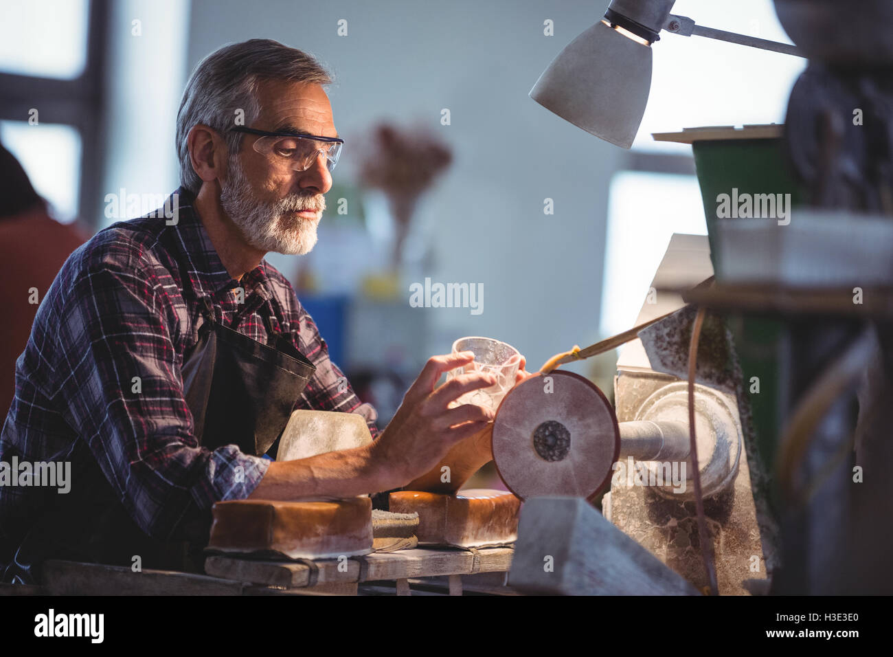Glassblower working on a glass Stock Photo - Alamy