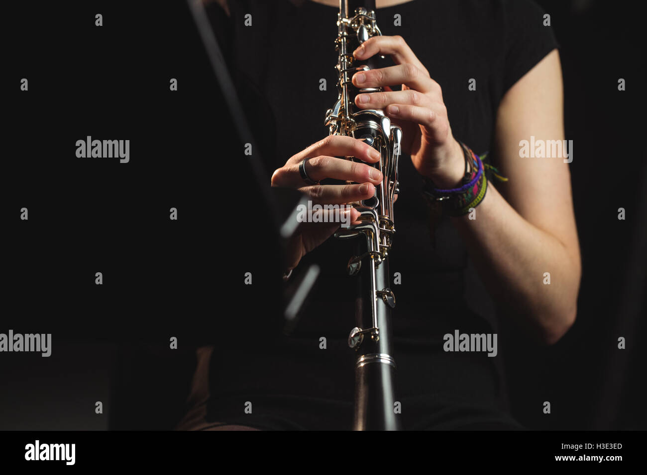 Woman playing a clarinet in music school Stock Photo - Alamy