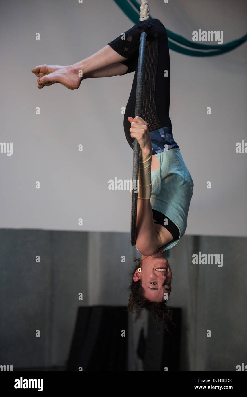 Gymnast performing gymnastics on hoop Stock Photo - Alamy
