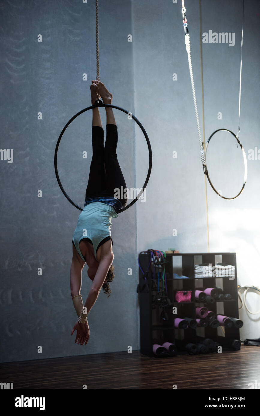 Gymnast performing gymnastics on hoop Stock Photo - Alamy