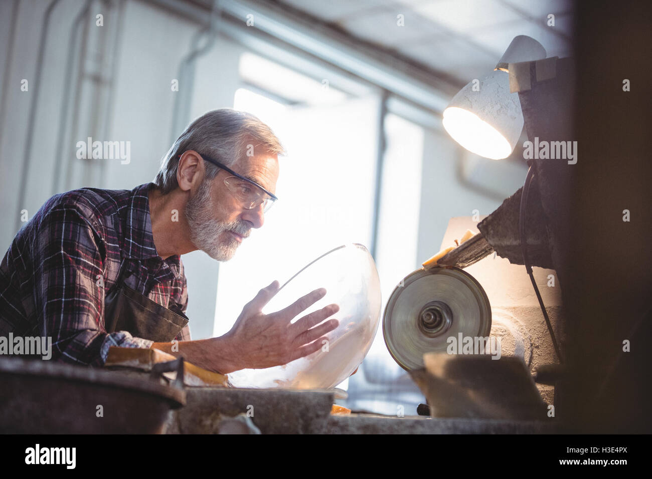 Glassblower working on a glass Stock Photo - Alamy