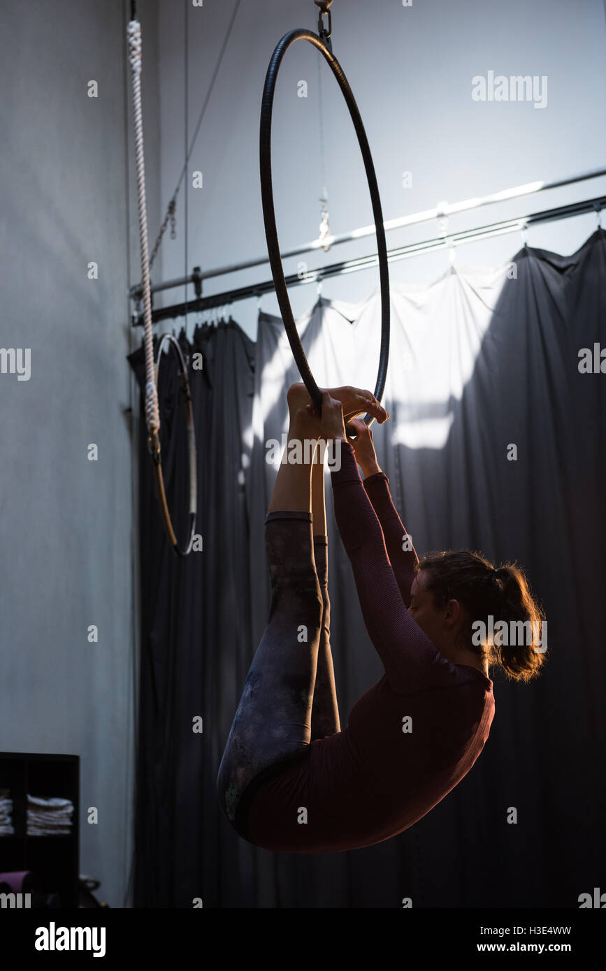 Gymnast performing gymnastics on hoop Stock Photo - Alamy