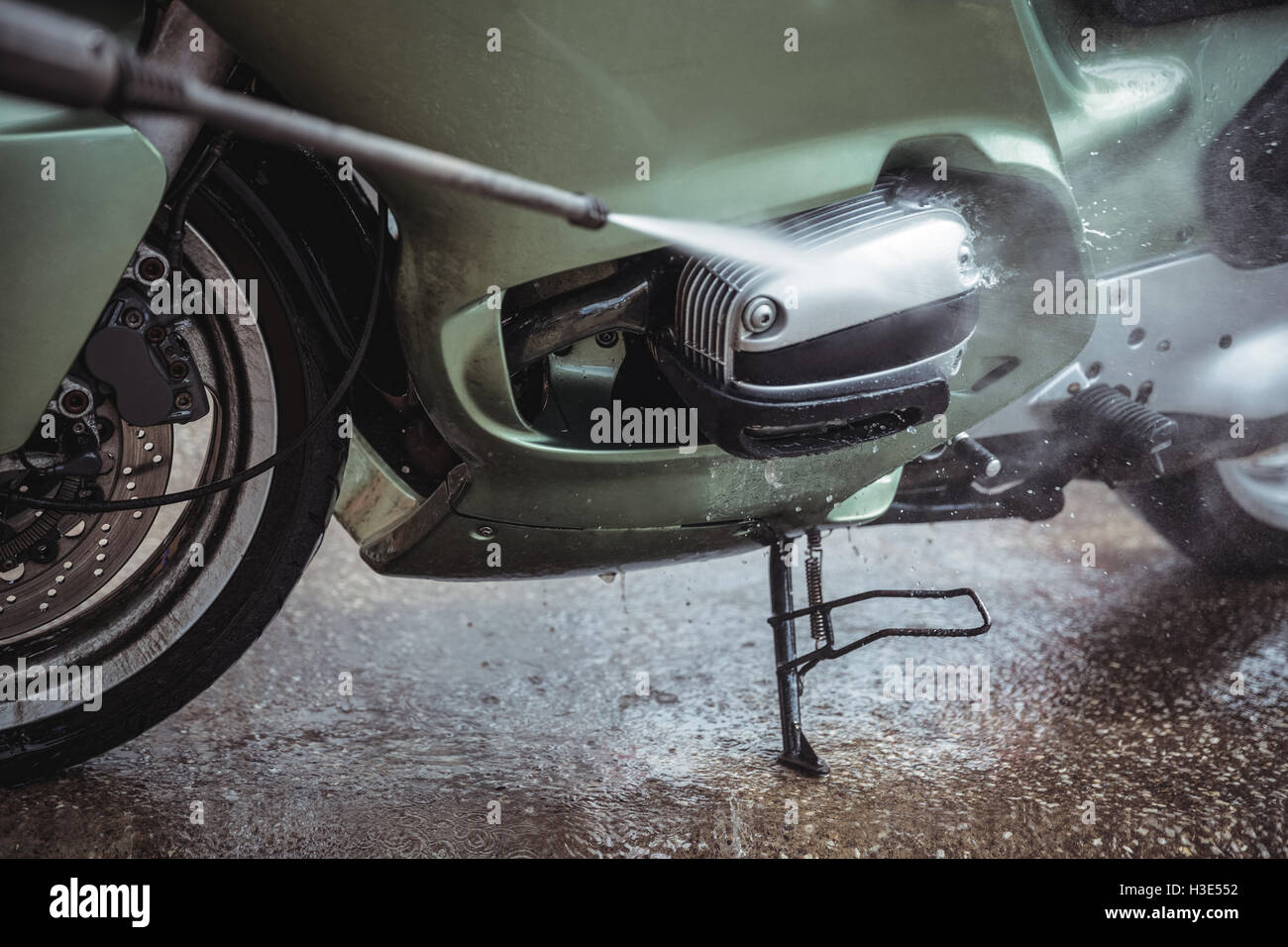 Motorcycle washing at workshop Stock Photo - Alamy