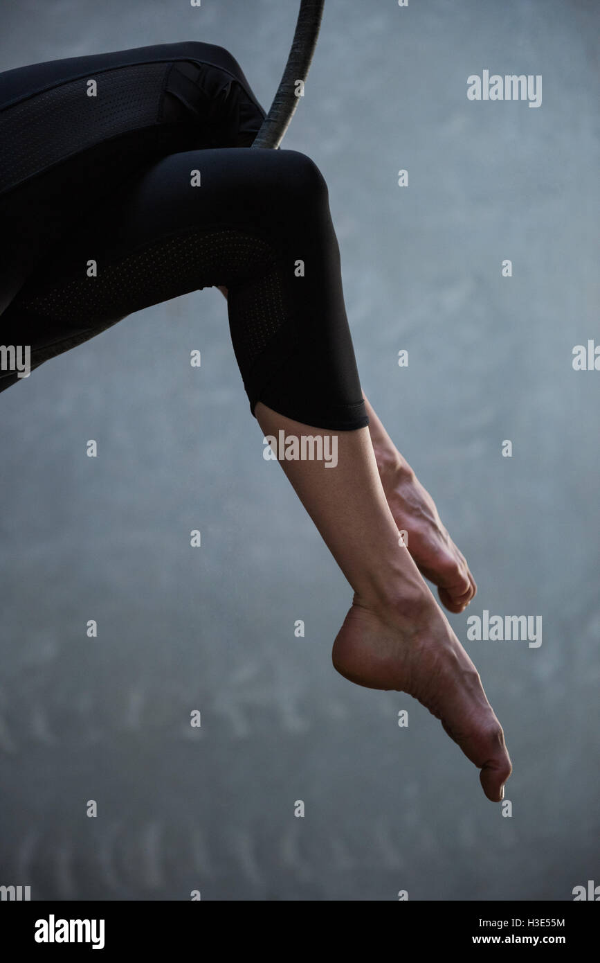 Gymnast balancing on hoop Stock Photo - Alamy
