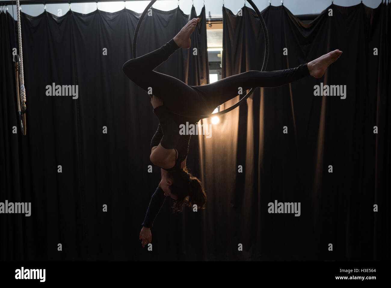 Gymnast performing gymnastics on hoop Stock Photo - Alamy
