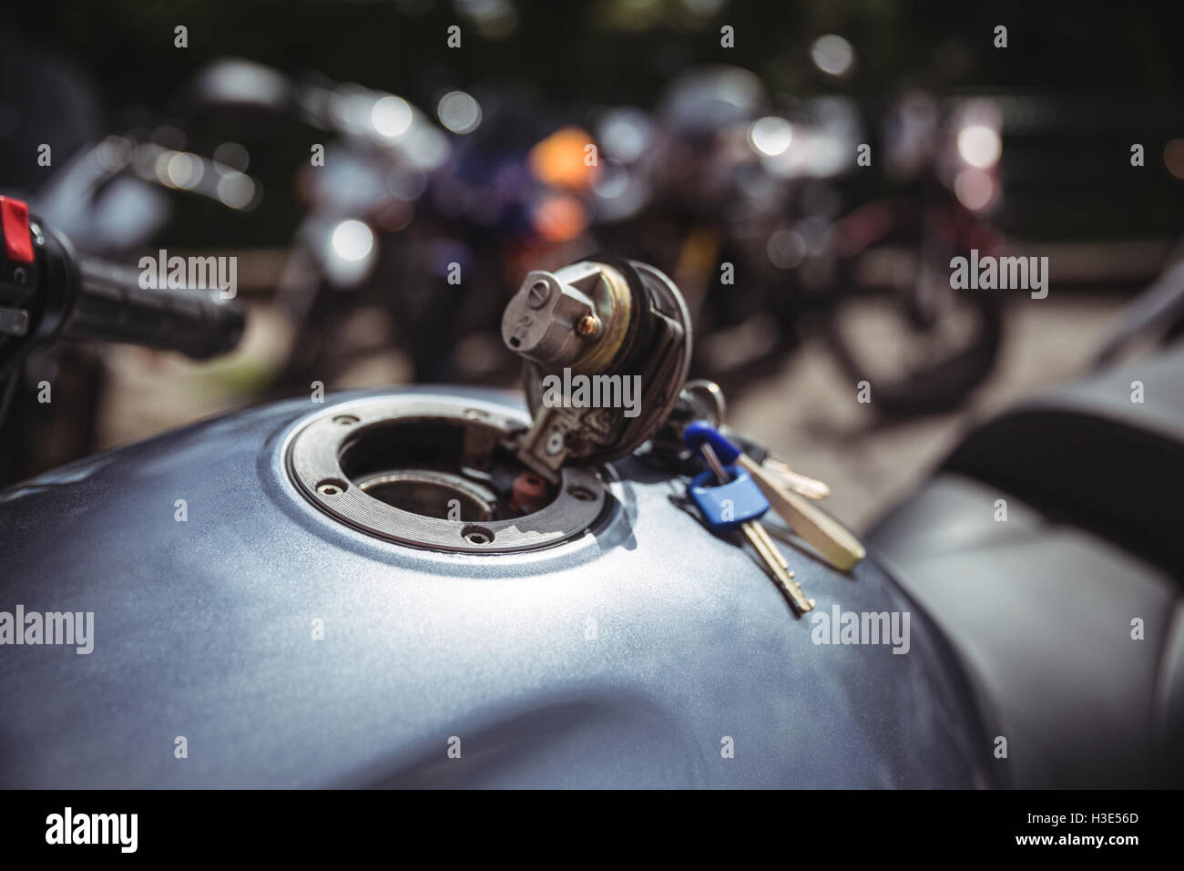 Fuel tank of motor bike with keys Stock Photo - Alamy