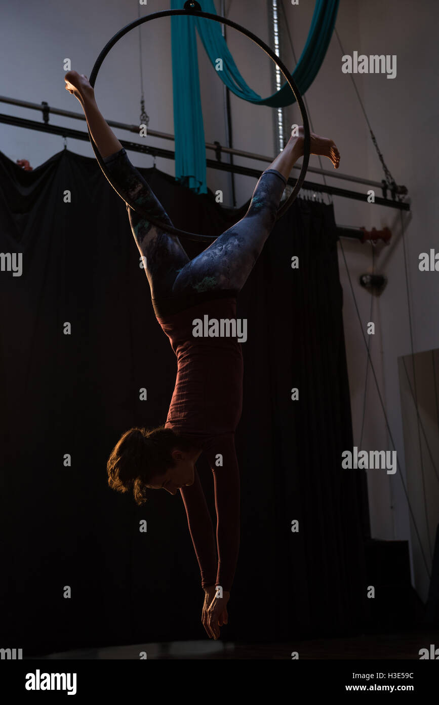 Gymnast performing gymnastics on hoop Stock Photo - Alamy