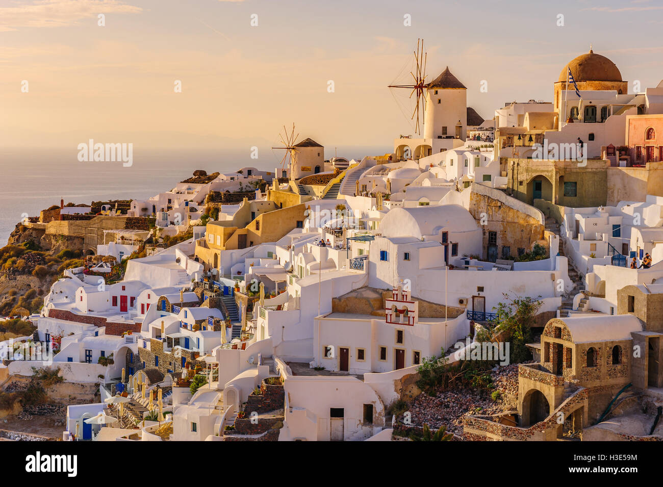 Oia in sunset rays at Santorini, Greece Stock Photo - Alamy