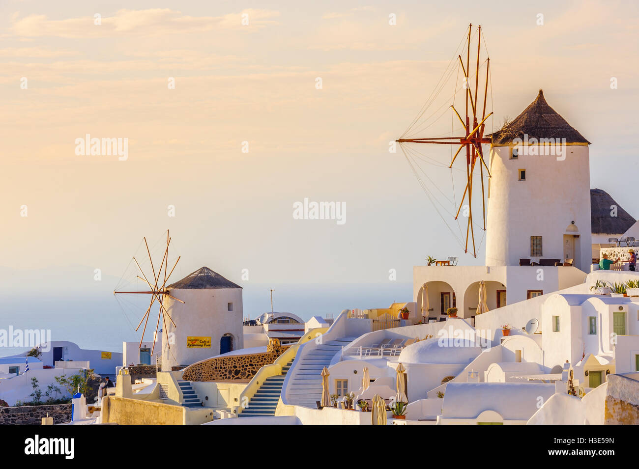 Oia in sunset rays at Santorini, Greece Stock Photo - Alamy
