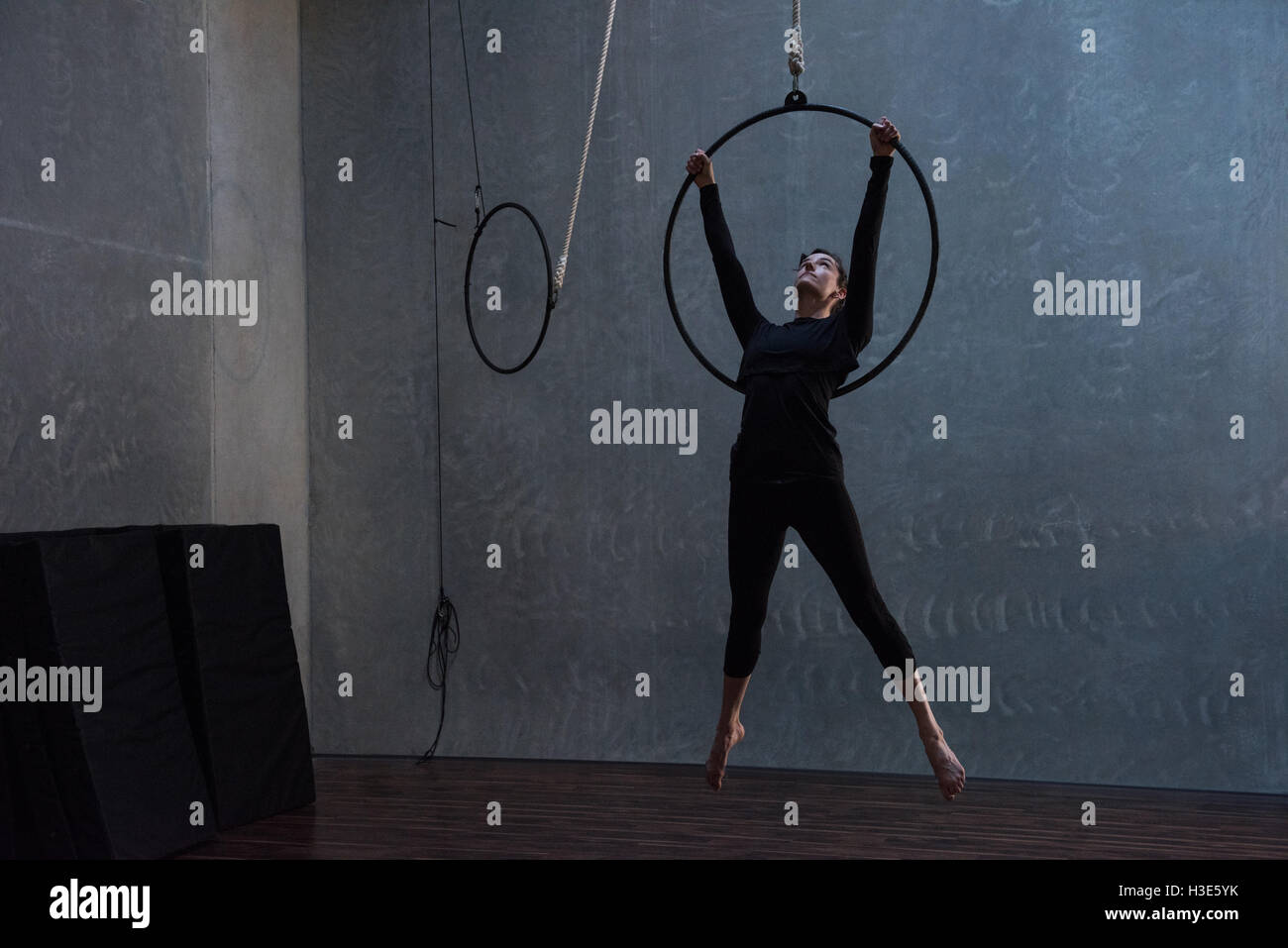 Gymnast performing gymnastics on hoop Stock Photo - Alamy