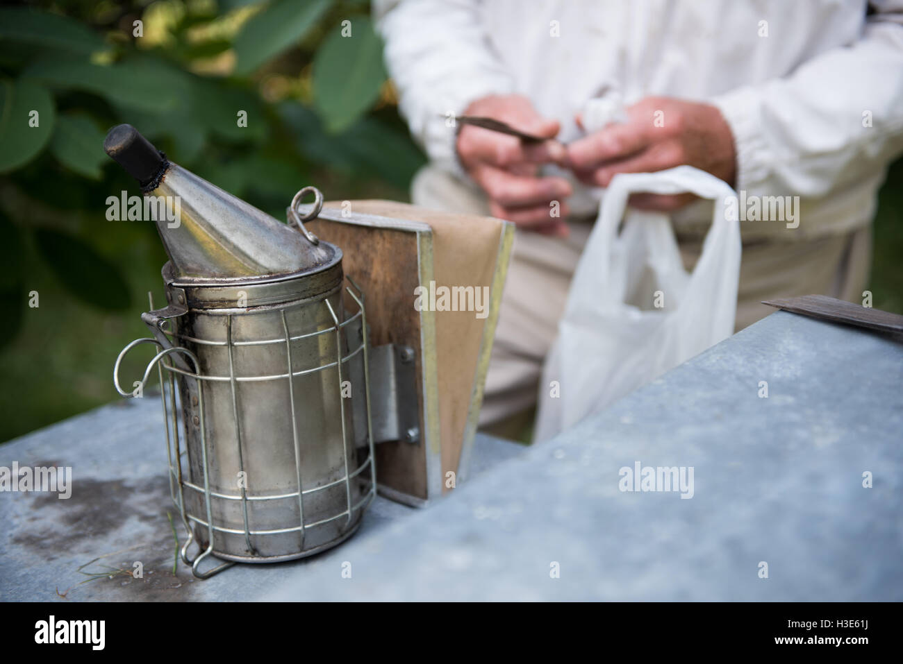 Bee smoker on box Stock Photo - Alamy