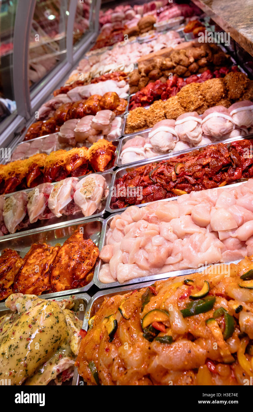 Variety of marinated meat at display counter Stock Photo - Alamy