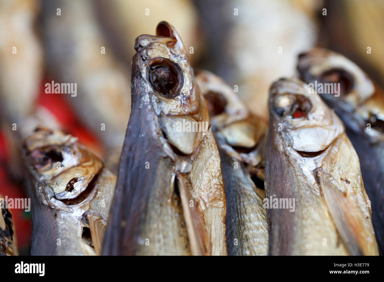 dried fish close up background eating seafood Stock Photo - Alamy