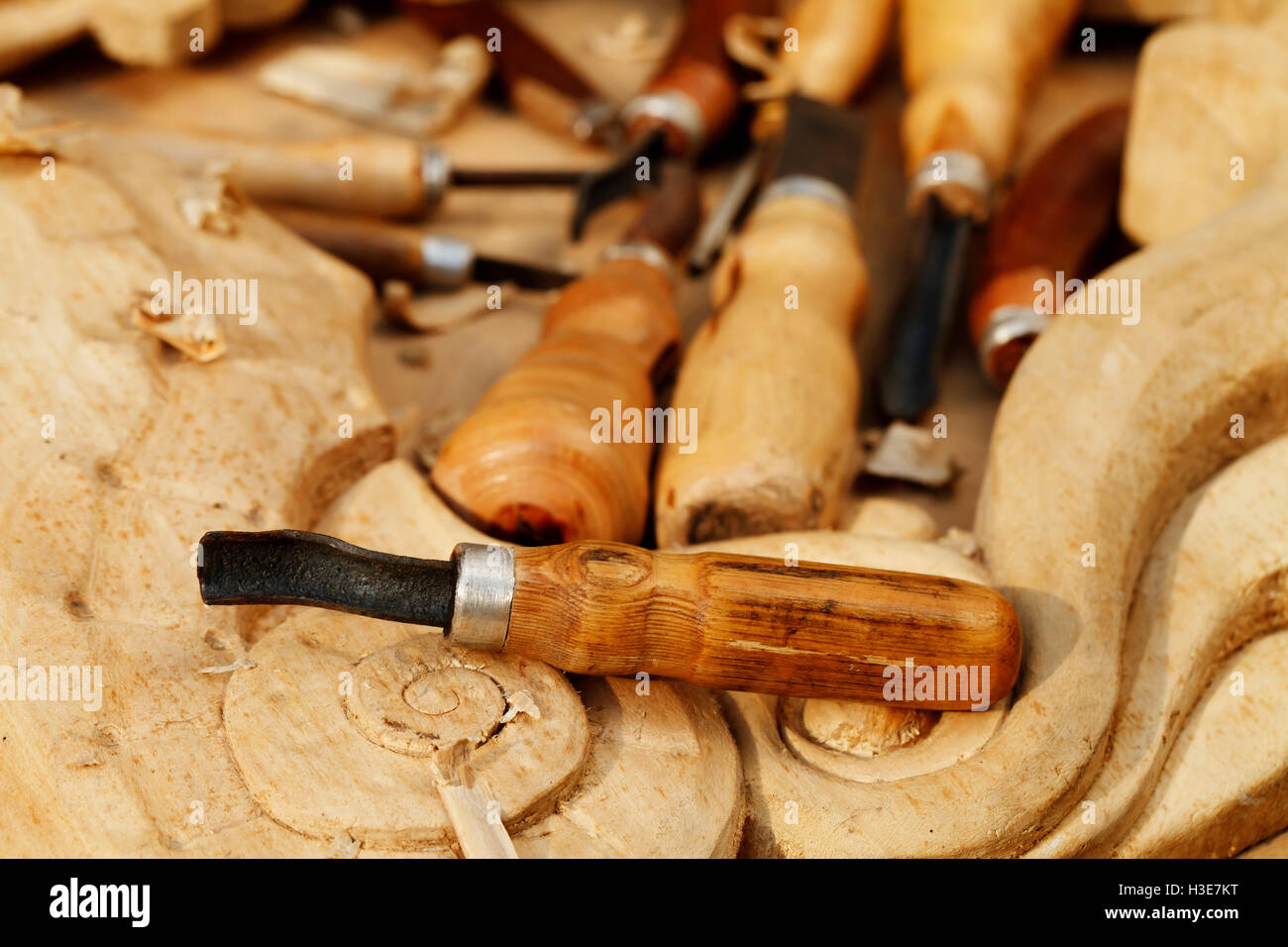 Vintage tools of woodcarving closeup on wooden background Stock Photo ...