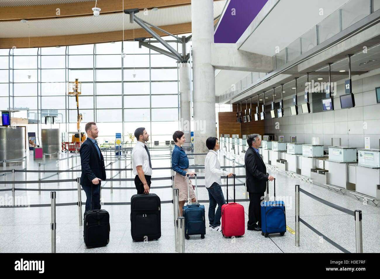 Queue airport hi-res stock photography and images - Alamy