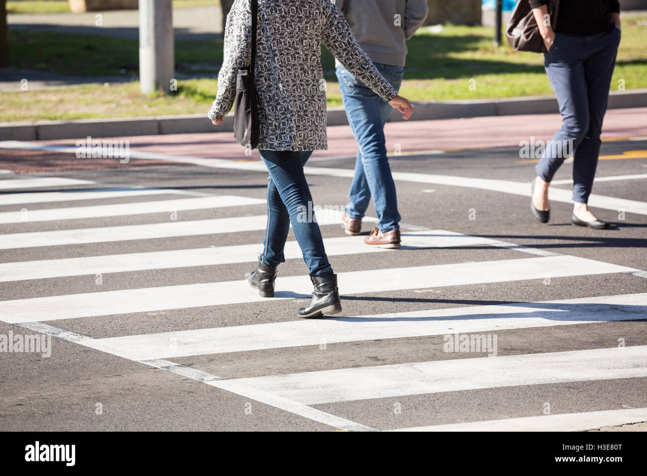 People crossing the road Stock Photo - Alamy
