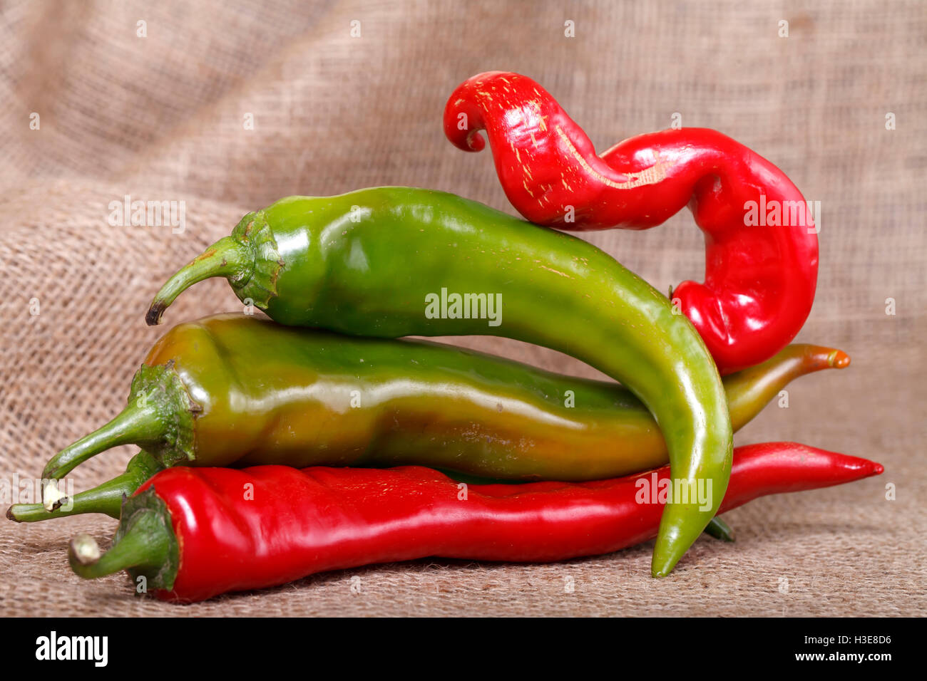 a hot peppers , beautiful background spices and condiments close up ...