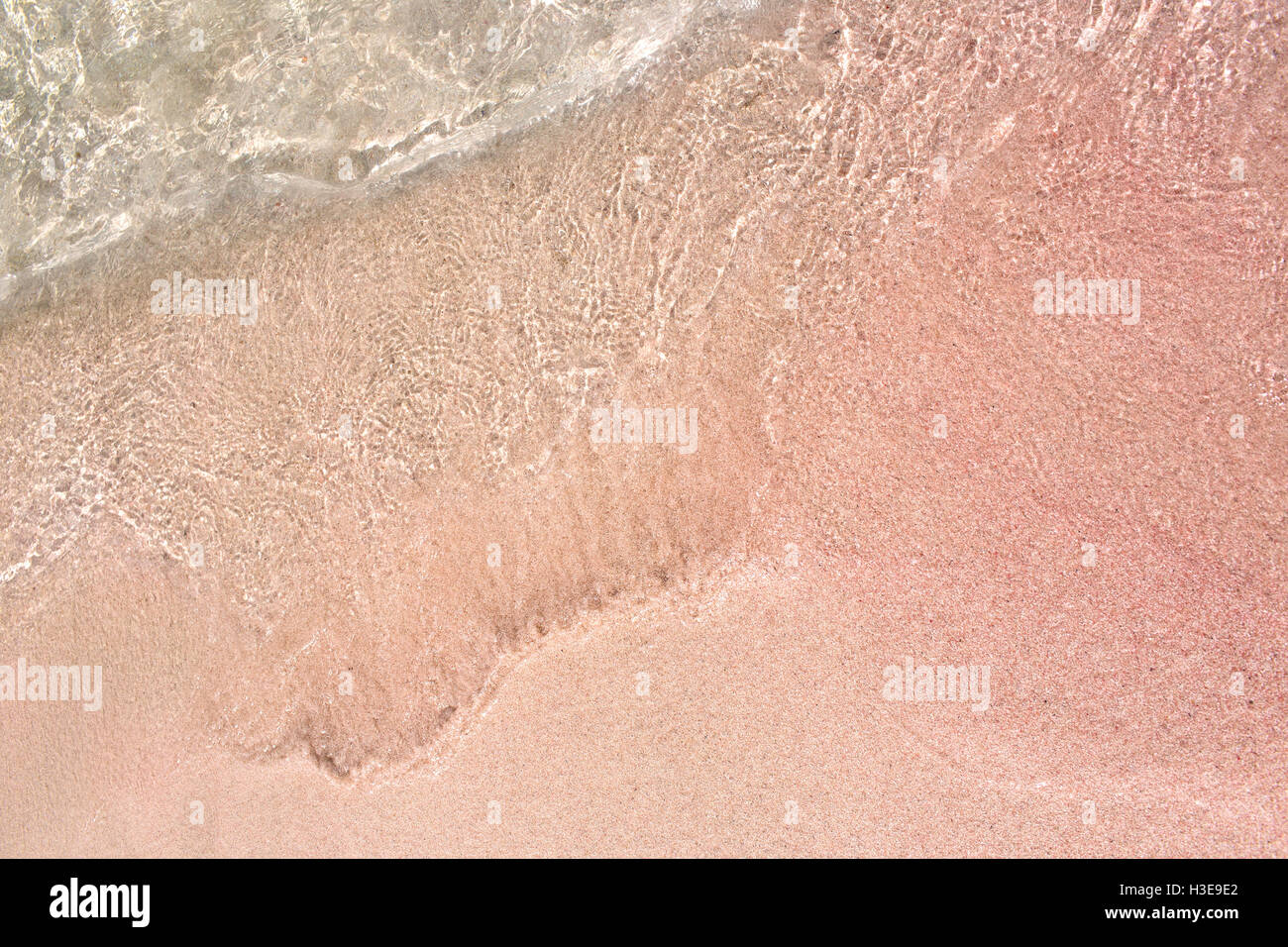 background of pink sand on the beach Stock Photo - Alamy