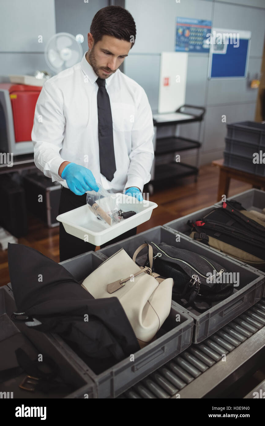Airport security tray hi-res stock photography and images - Alamy