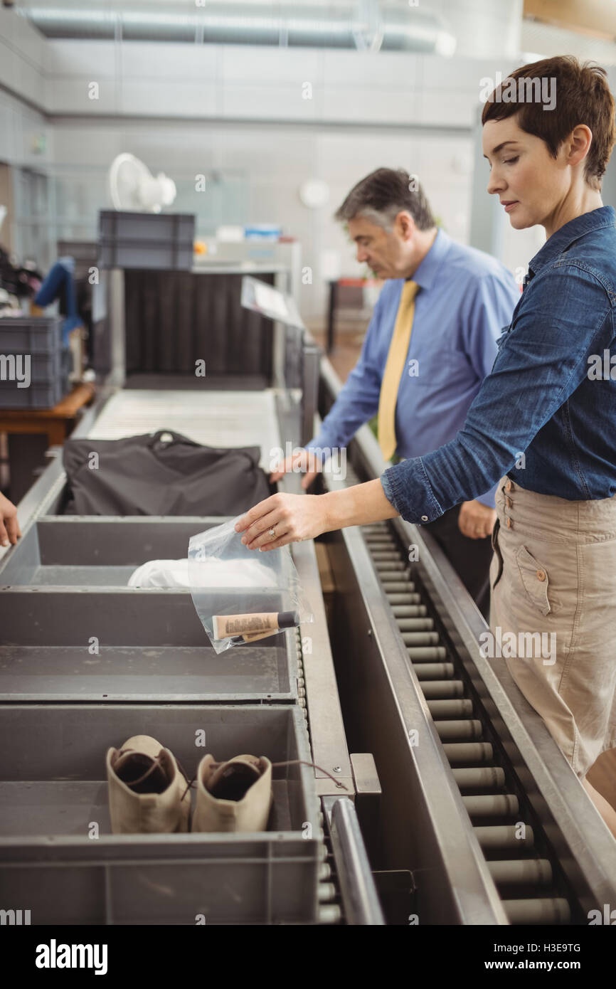 Airport security tray hi-res stock photography and images - Alamy