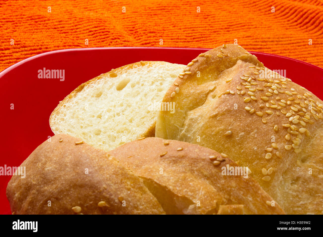 sliced whole wheat breads on a red plate Stock Photo - Alamy