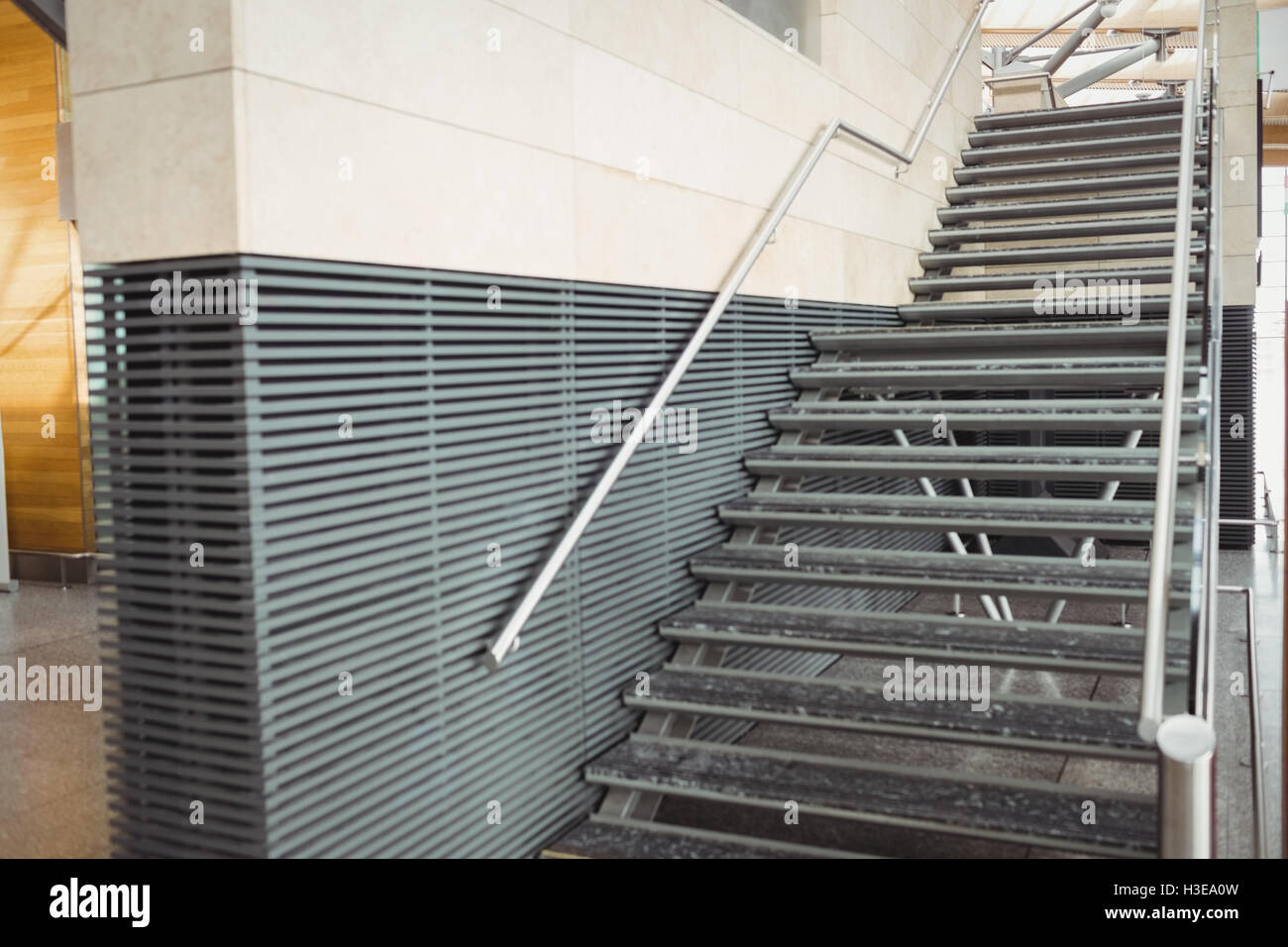 Staircase in airport terminal Stock Photo - Alamy