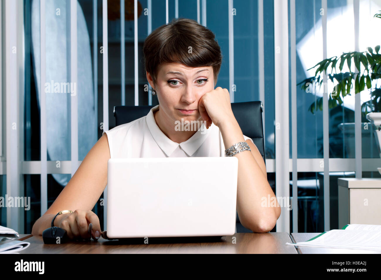 Young business woman in the office, emotions and gestures at work Stock ...