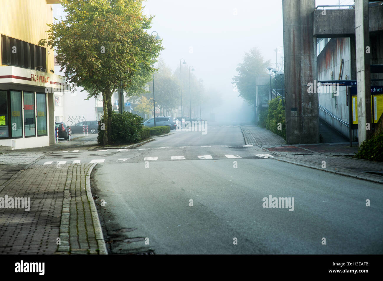 Fog or Mist Rolling Down a Quiet Deserted Towns Main Street Stock Photo ...