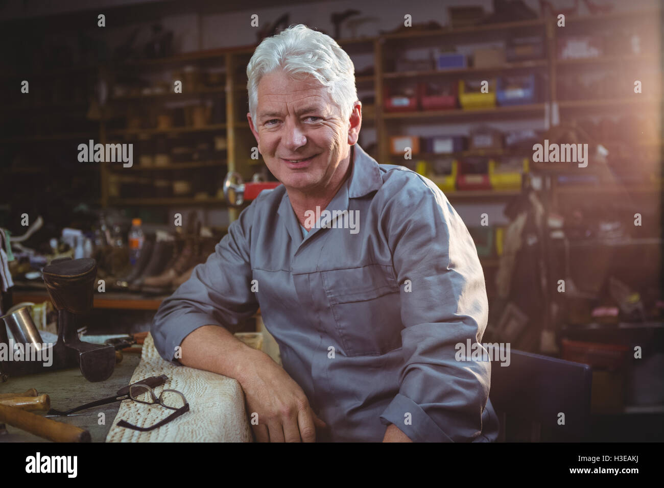 Smiling craftsman sitting in hi-res stock photography and images - Alamy