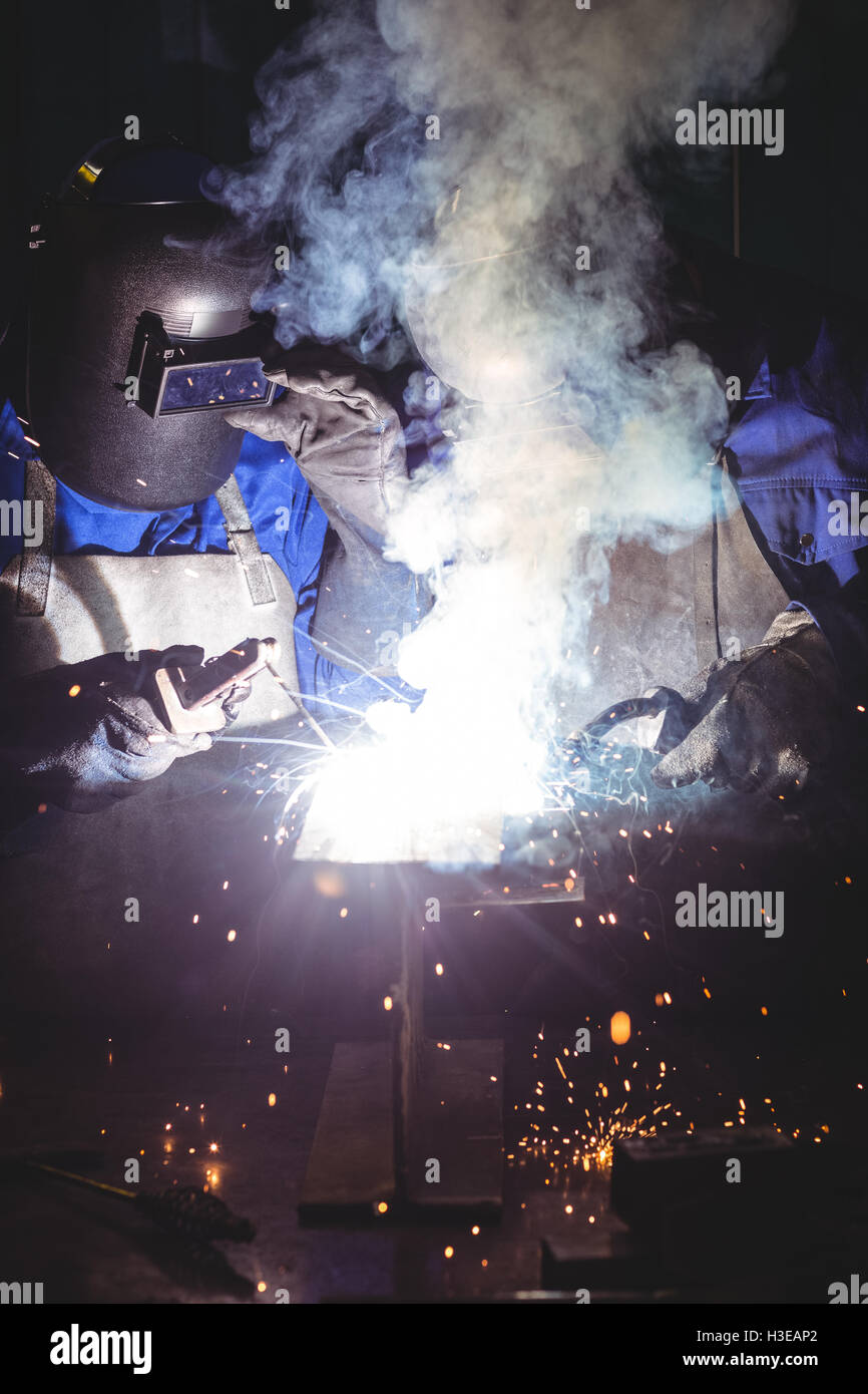Two welders working welding metal hi-res stock photography and images ...