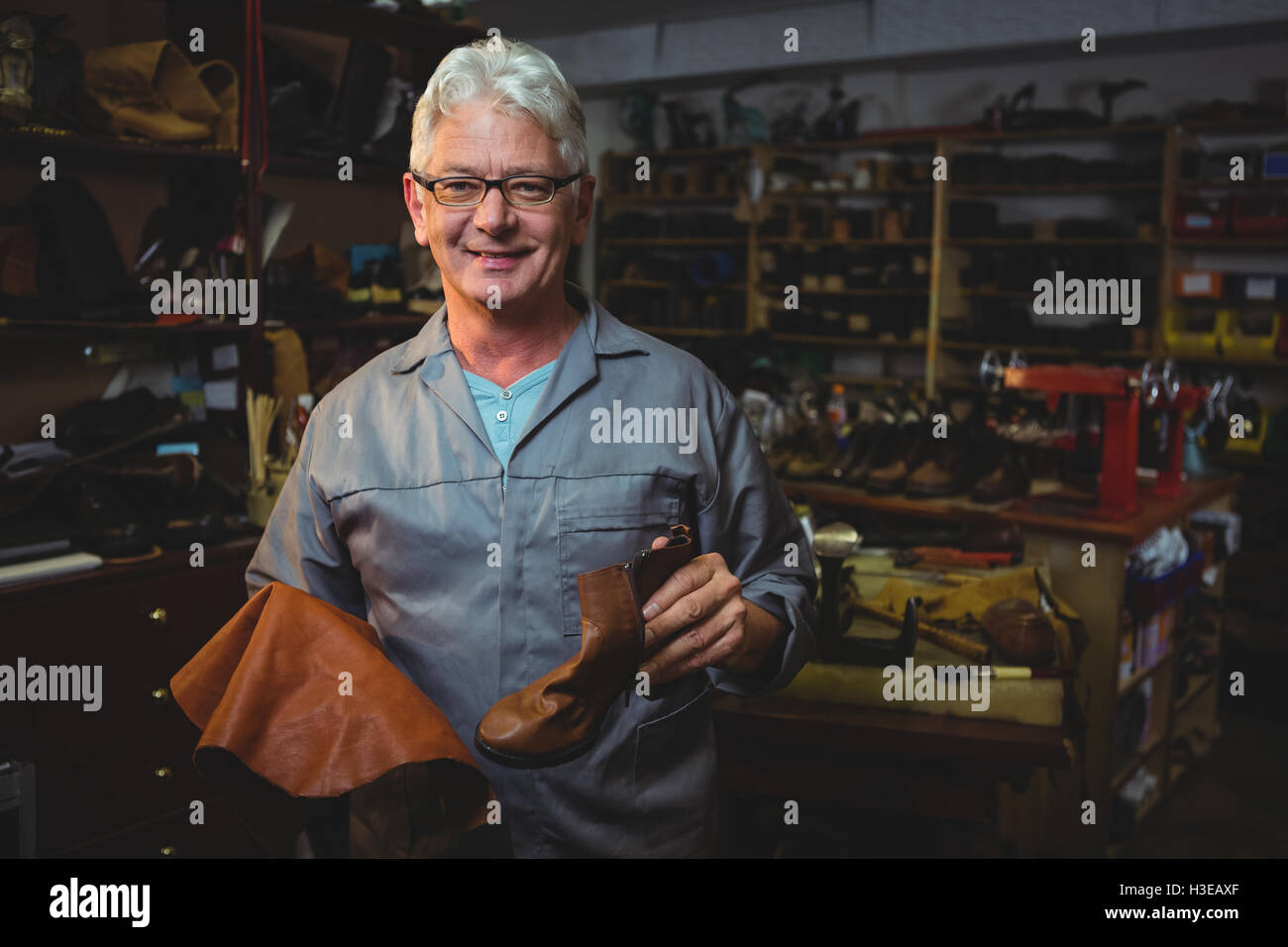 Holding boot hi-res stock photography and images - Alamy
