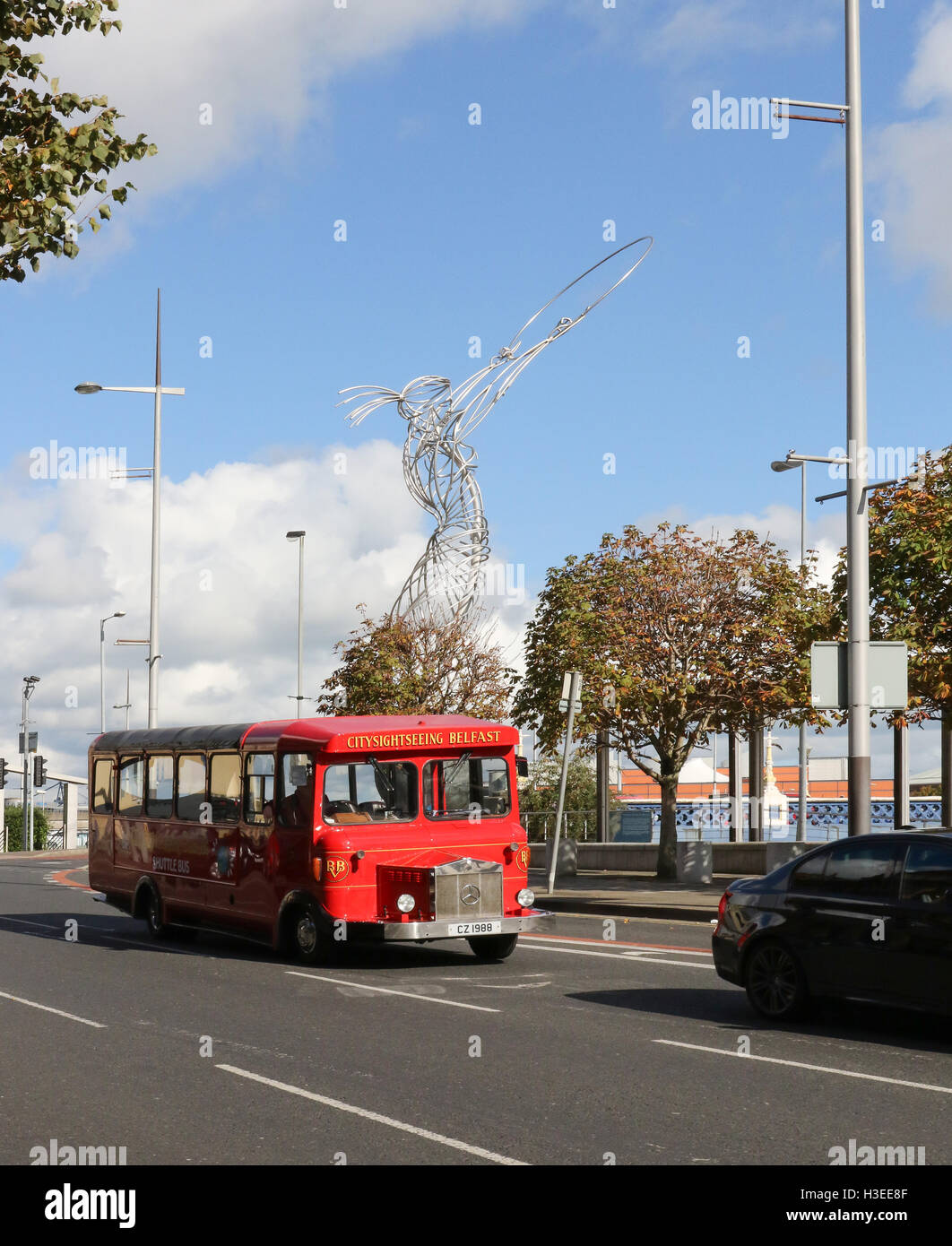 Red single decker City Sightseeing bus in Belfast, at Oxford Street ...