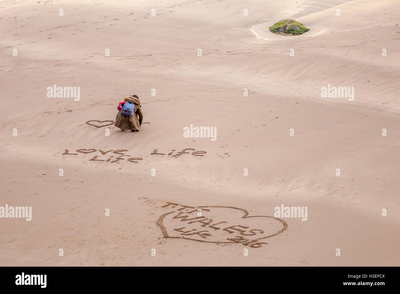 Stick writing in sand hi-res stock photography and images - Alamy
