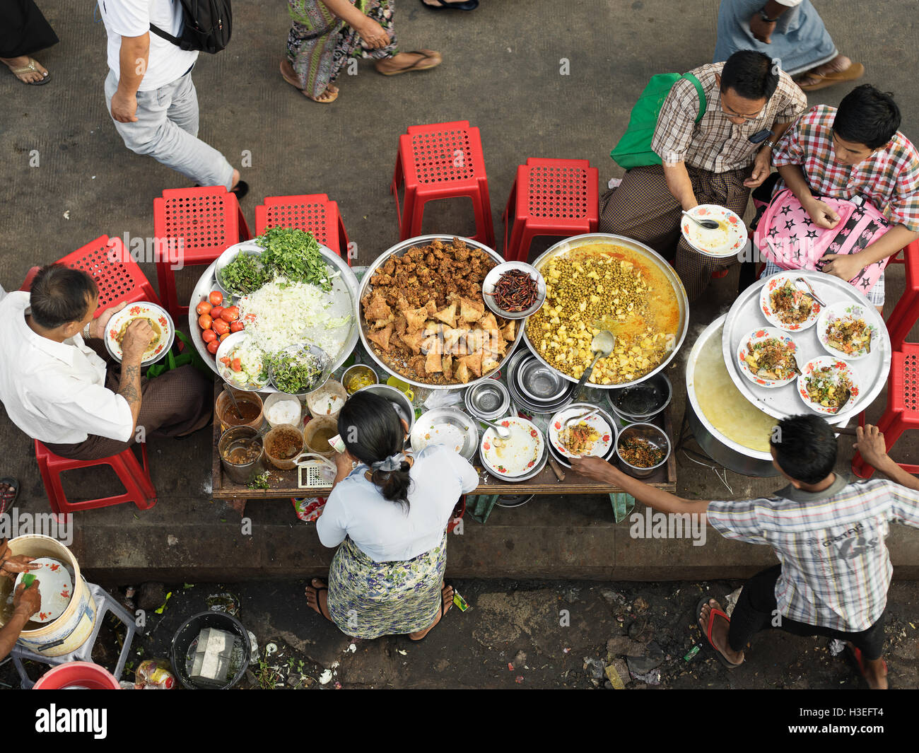 Townspeople gather for a community feast in Yangon, Myanmar (Burma ...
