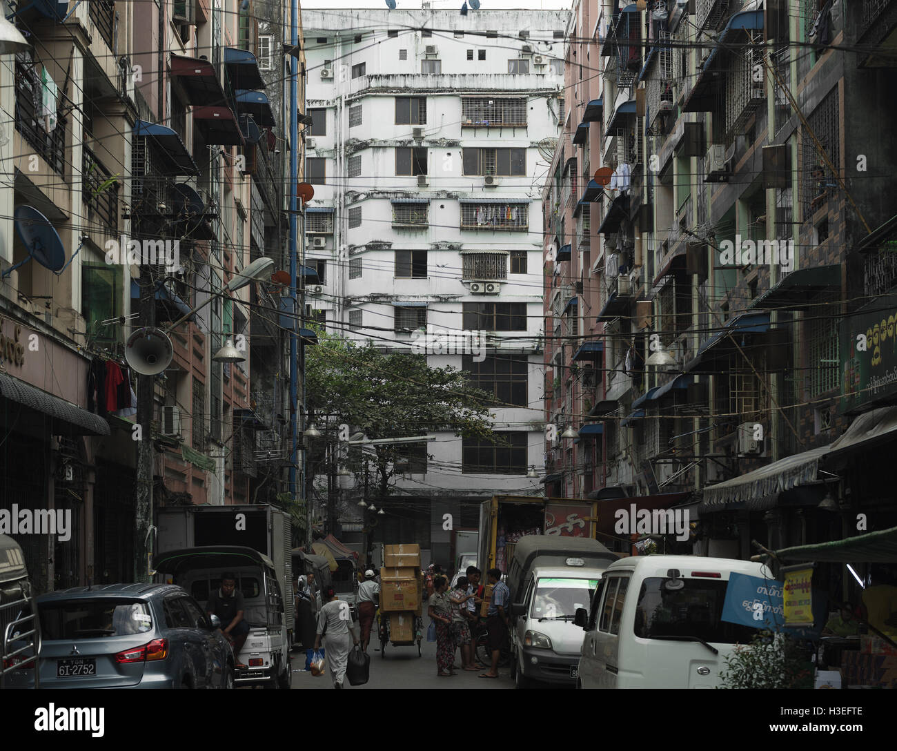 Looking down a busy alley in Yangon, Myanmar (Burma Stock Photo - Alamy