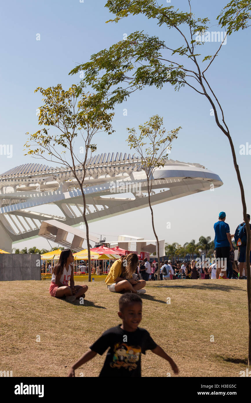 People enjoy the sunny day at Pier Maua next to the revitalized Praca ...